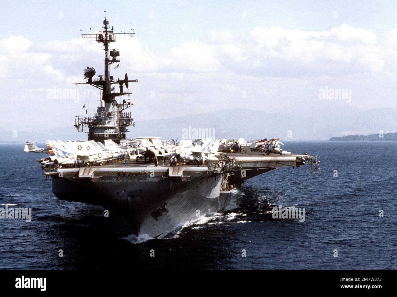 A bow view of the aircraft carrier USS CORAL SEA (CV 43) underway near ...