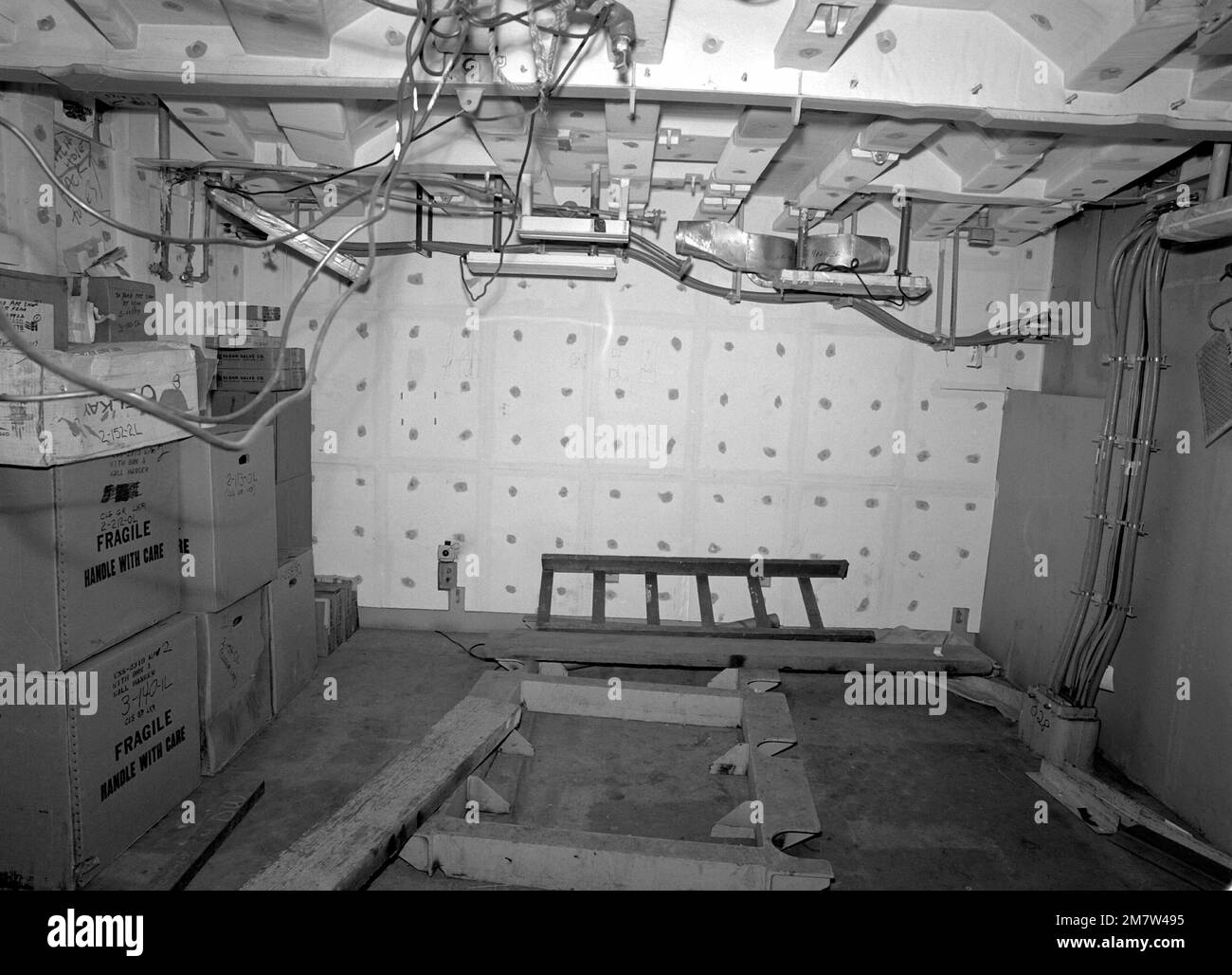 The helicopter haul-down and traverse machinery room aboard the guided ...