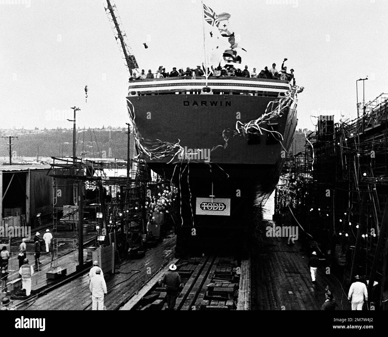 A stern view of the Australian frigate DARWIN (F-04) sliding down the ...