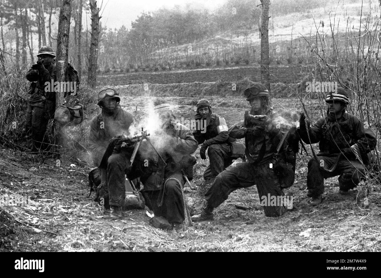 A machine gun crew from the Combat Support Co., 1ST Bn., 21st Inf ...
