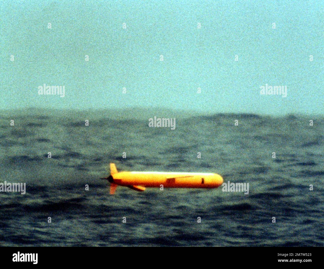 A view of a BGM-109 Tomahawk missile, before entering the water, during ...
