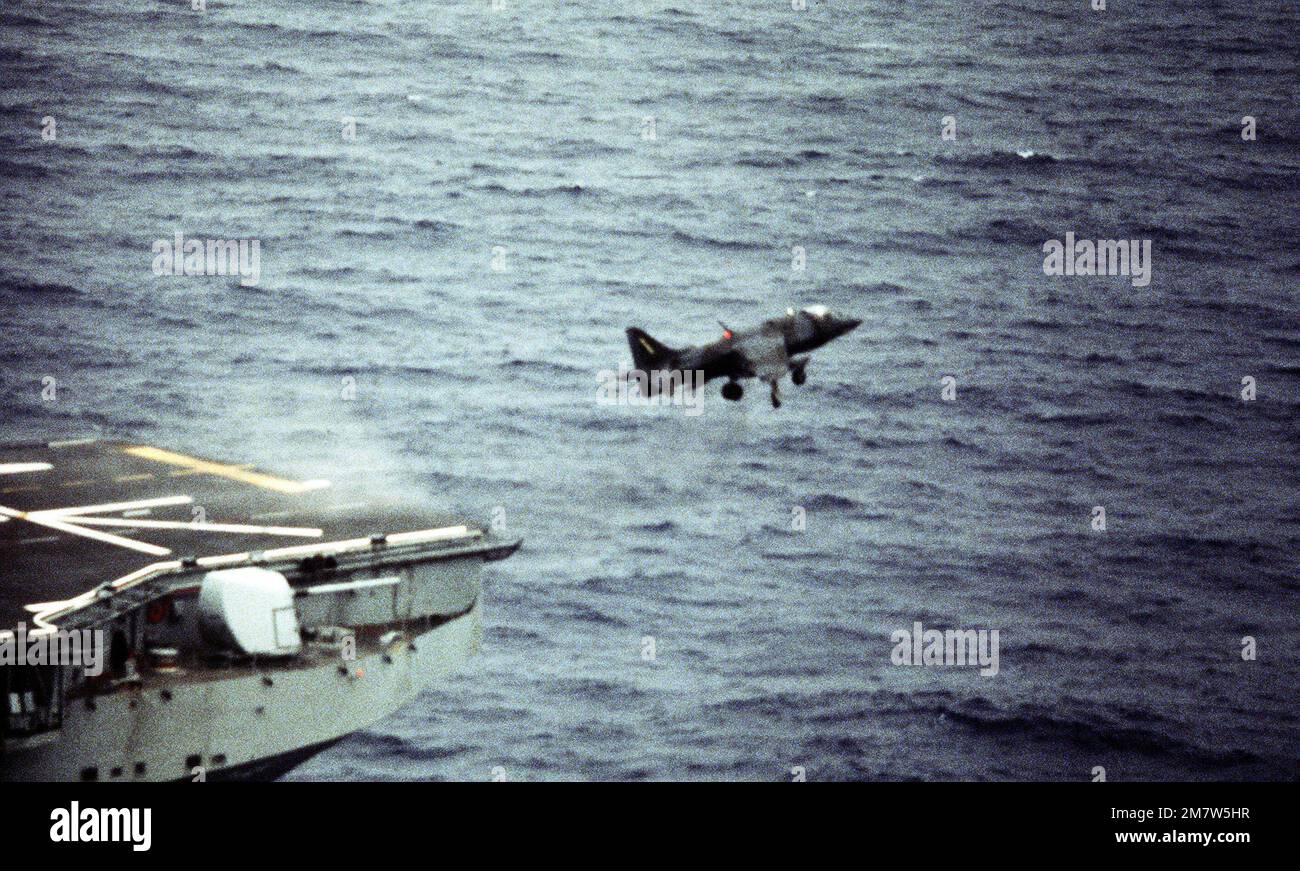 An AV-8A Harrier aircraft takes off from the amphibious assault ship ...