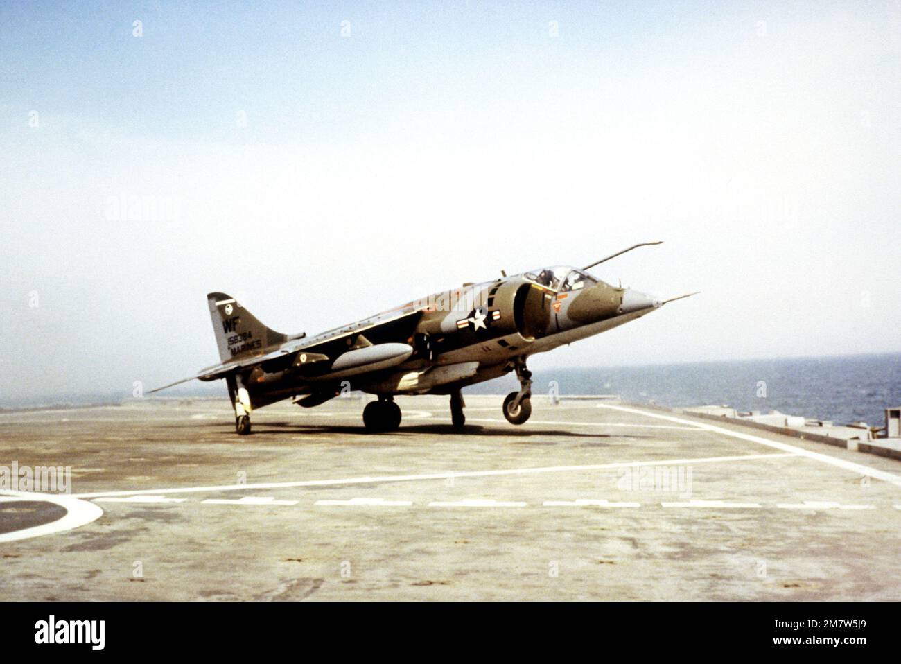A right side view of an AV-8A Harrier aircraft beginning its takeoff ...