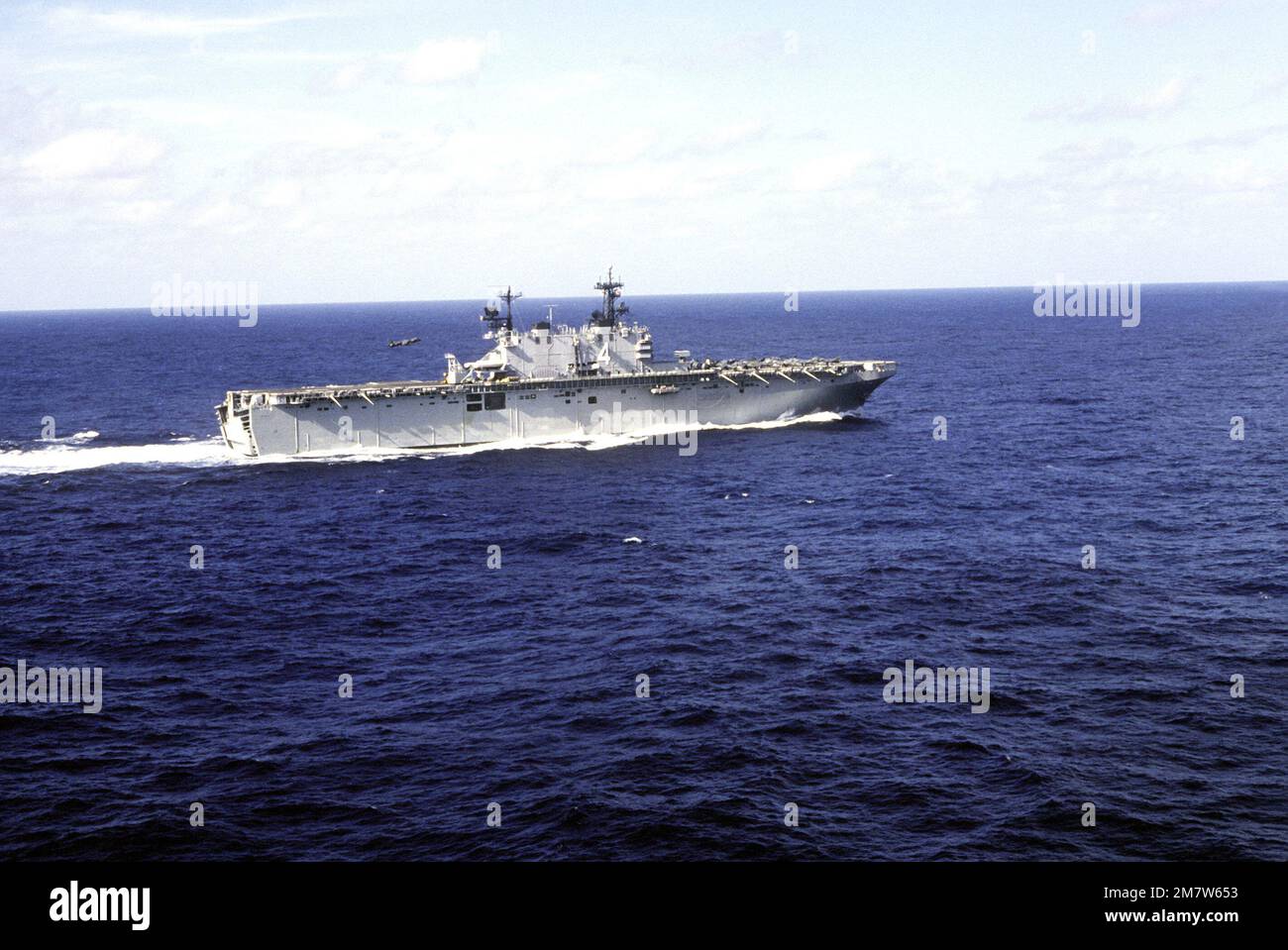 An aerial starboard beam view of the amphibious assault ship USS NASSAU ...