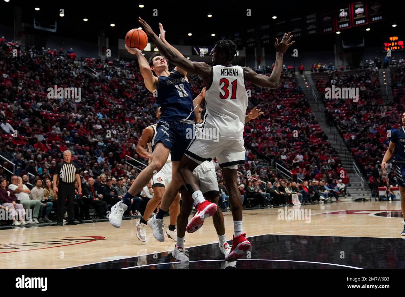 Nevada forward Nick Davidson (11) shoots as San Diego State forward ...