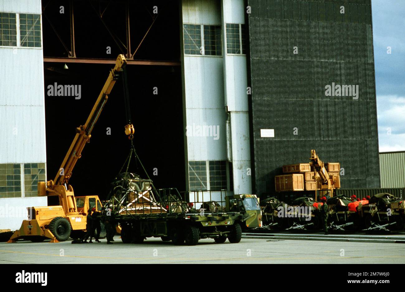 Cargo riggers from the 82nd Airborne Division prepare cargo for the Low ...