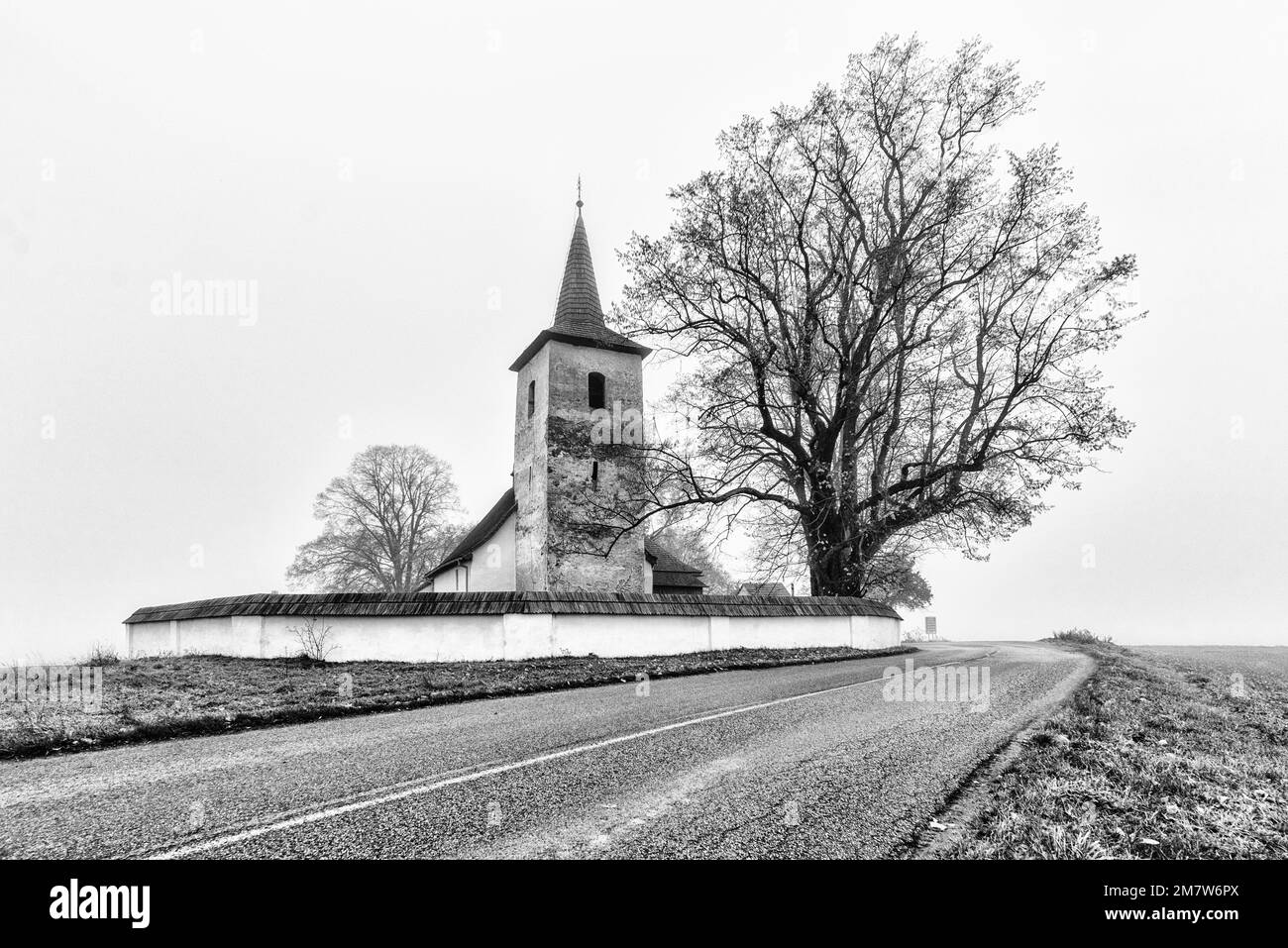 Old gothic church in Ludrova village near Ruzomberok, Slovakia. Black ...
