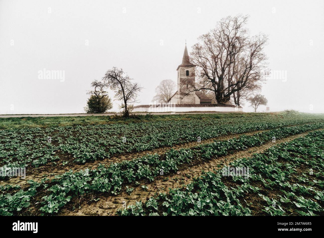 Rural country with blurred car motion and old gothic church in Ludrova ...