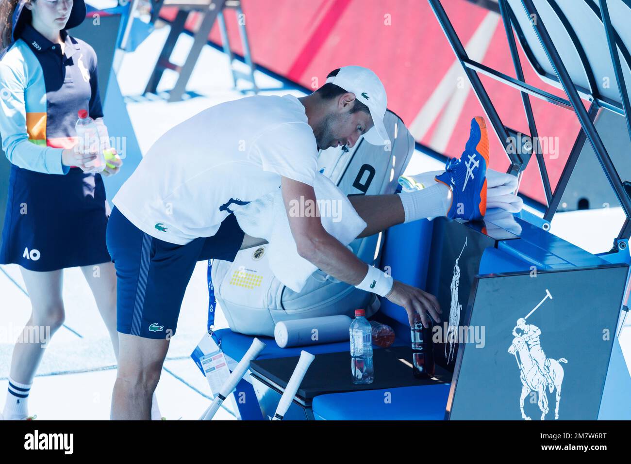 Melbourne, Australia. 11th Jan, 2023. Novak Djokovic stretches his ...