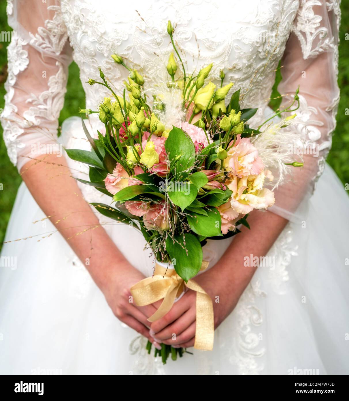 Bride holding beautiful big wedding bouquet Stock Photo - Alamy
