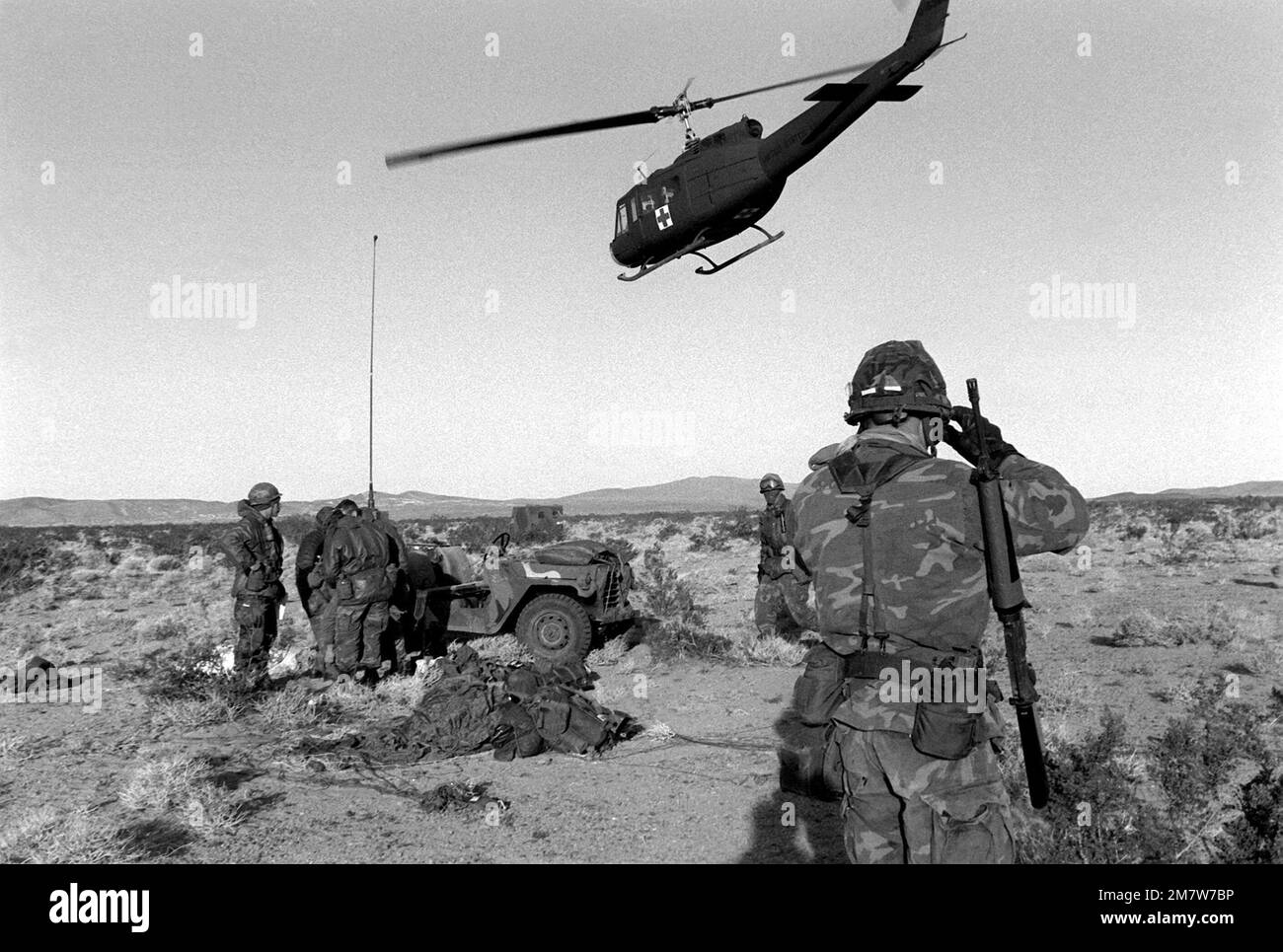 An Army UH-1 Iroquois medevac helicopter prepares to pick up a ...