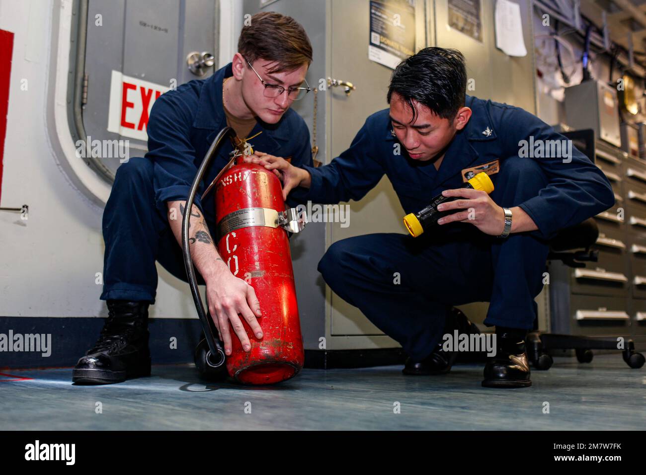 PHILIPPINE SEA (May 14, 2022) Airman Albert Scerbo, left, from Kennesaw ...