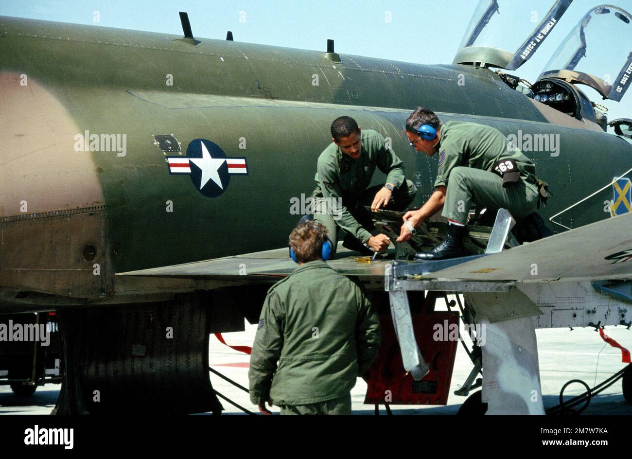 Ground crewmen from the 37th Tactical Fighter Wing perform maintenance ...