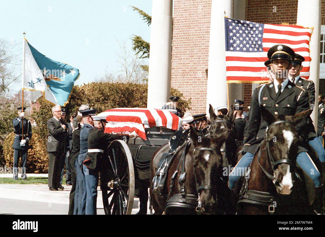 The joint services honor guard place the casket on the caisson during ...