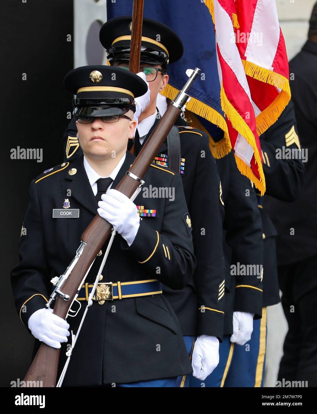 Soldiers with the Indiana National Guard ceremonial unit present the ...