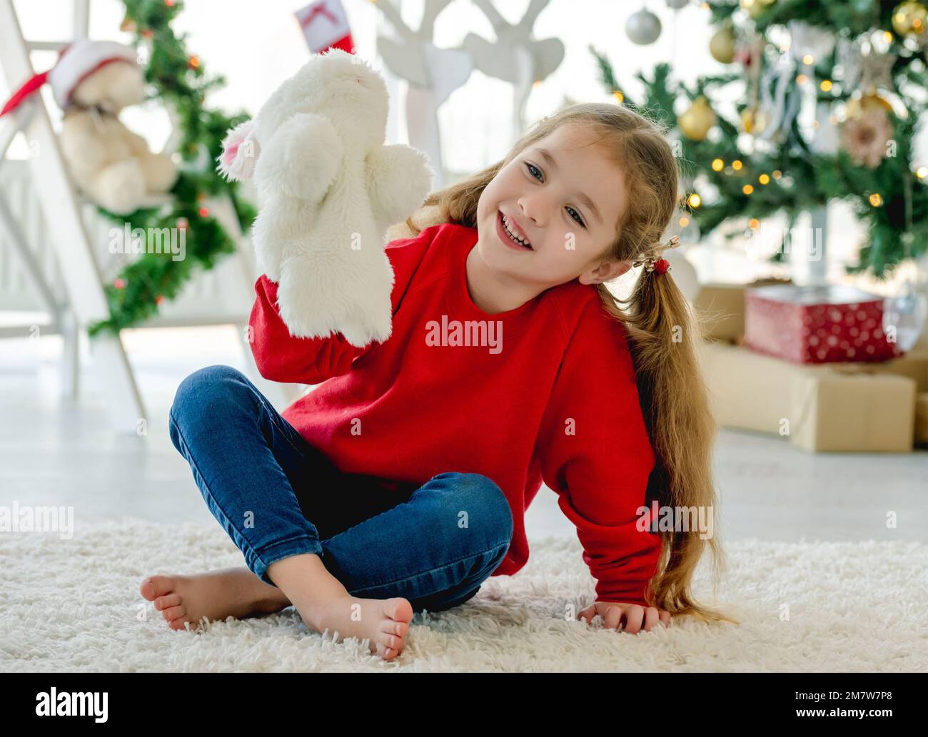 Child girl in Christmas time Stock Photo - Alamy