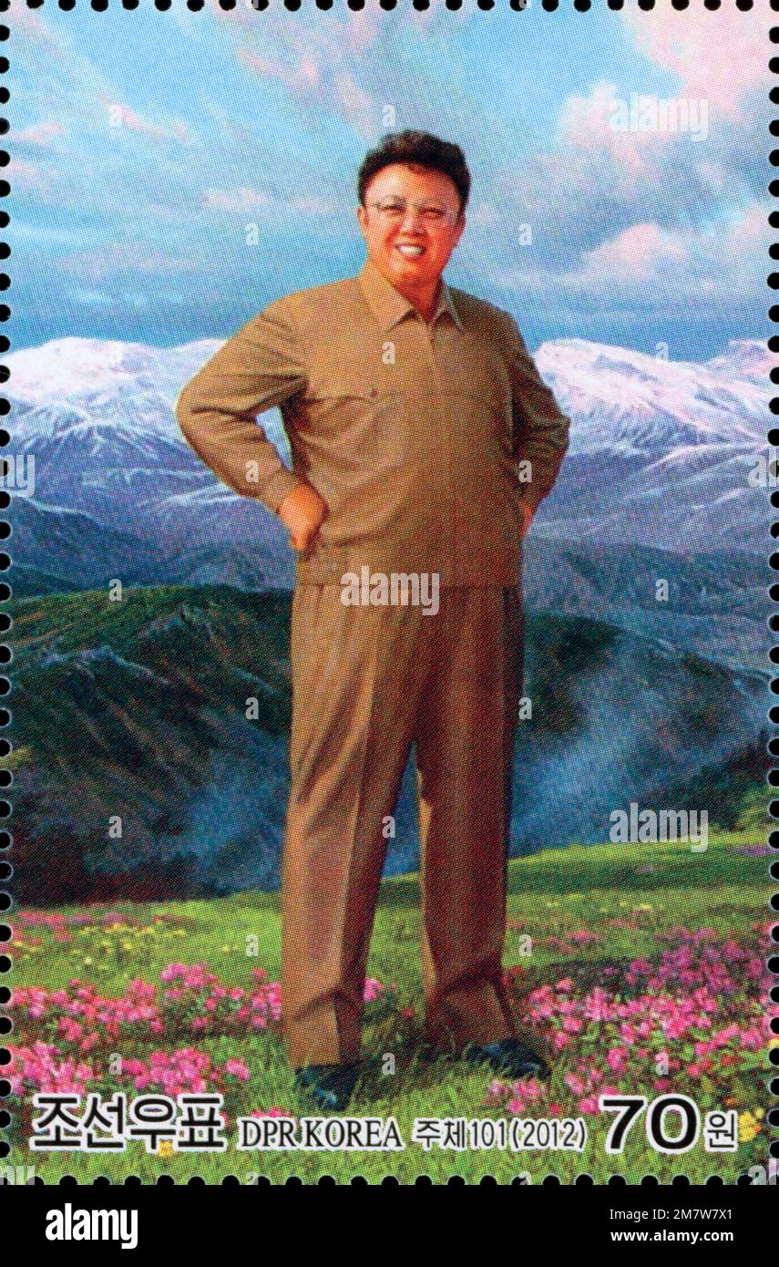 2012 North Korea stamp. 70th birthday of Kim Jong Il. General standing ...