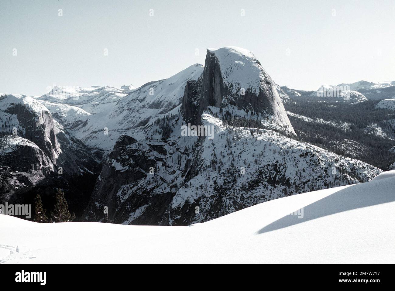 Snow covered mountain peaks. Base: Yosemite National Park State ...