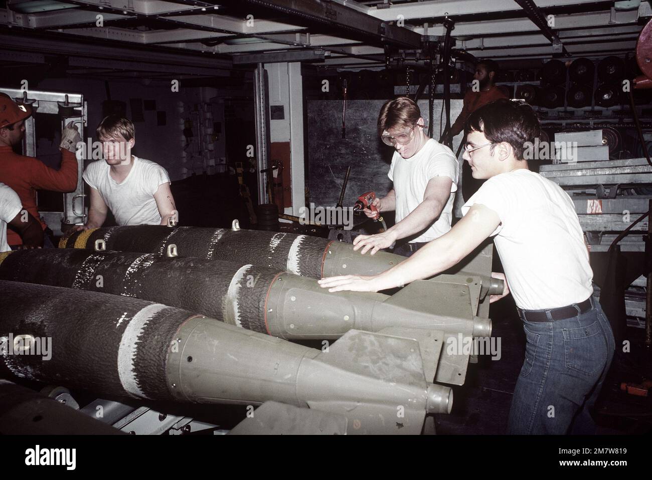 A view of the bomb preparation table with Mark 82 bombs on it in the ...
