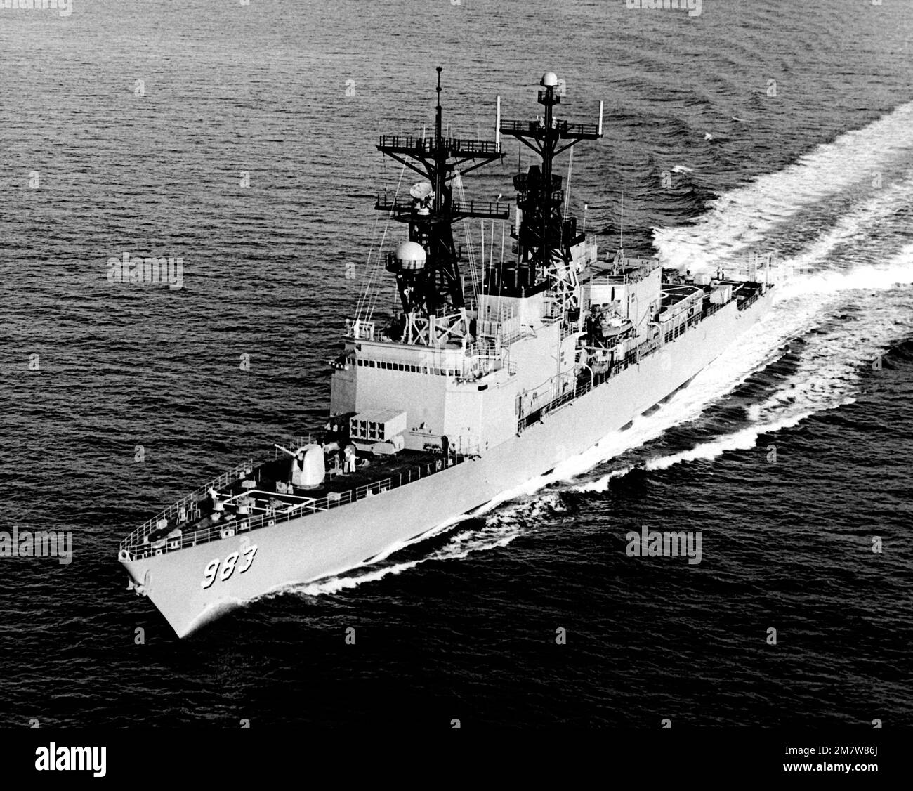 An aerial port bow view of the destroyer USS JOHN RODGERS (DD-983 ...