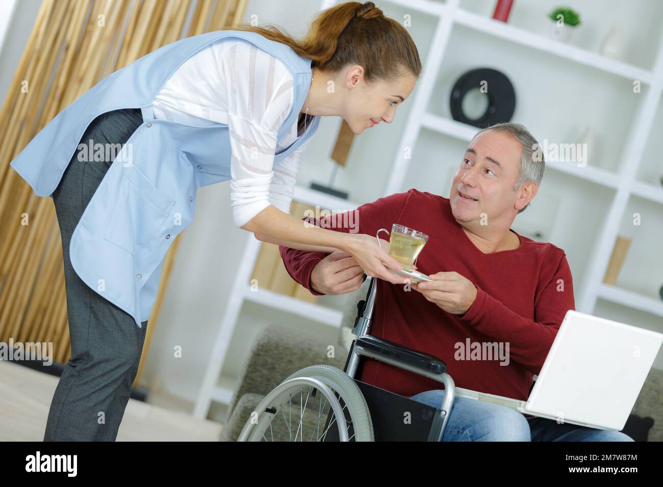 serving tea old man Stock Photo - Alamy