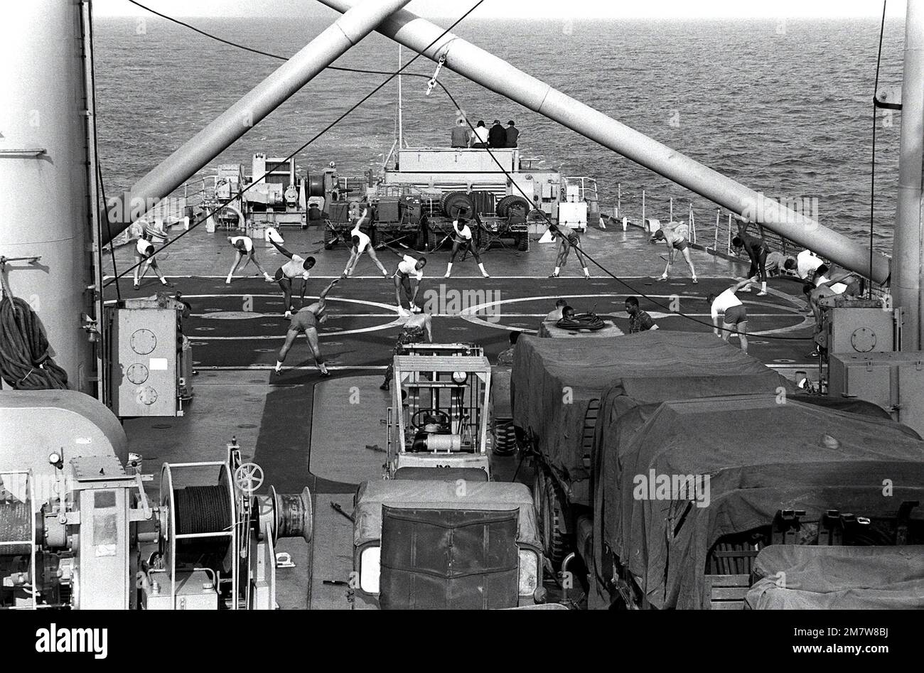 U.S. Marines exercise on the flight deck of the tank landing ship USS ...