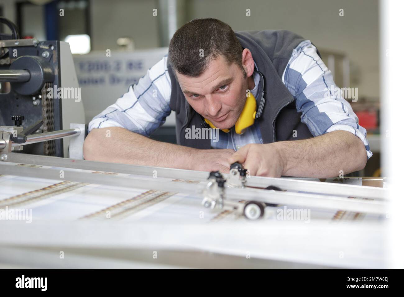 Man paint printing press machine hi-res stock photography and images ...