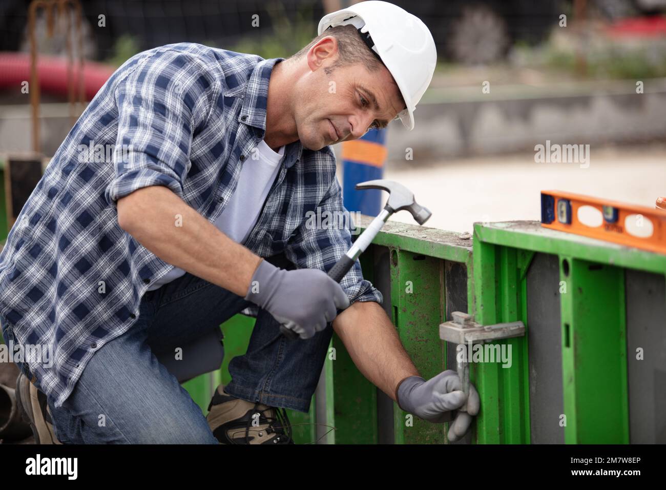 mason worker at construction site Stock Photo - Alamy