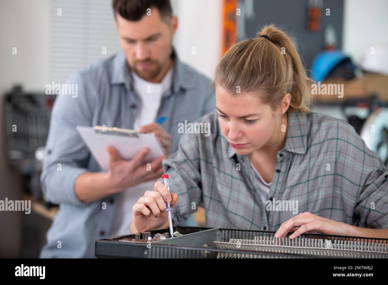 female mechanic apprentice during test Stock Photo - Alamy