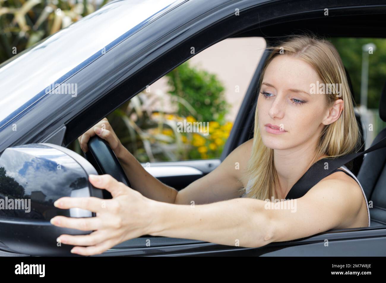 Sideview young beautiful woman hi-res stock photography and images - Alamy
