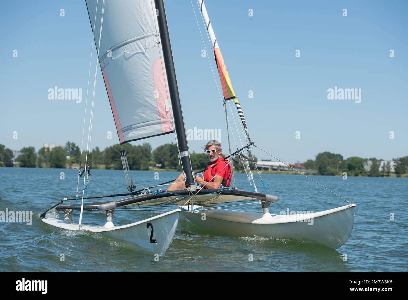 Senior captain on sailboat hi-res stock photography and images - Alamy