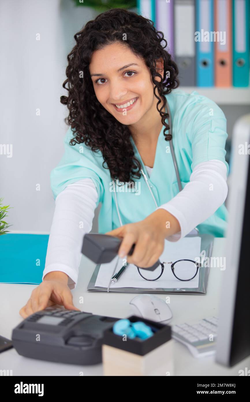 happy doctor on the phone in her office Stock Photo - Alamy