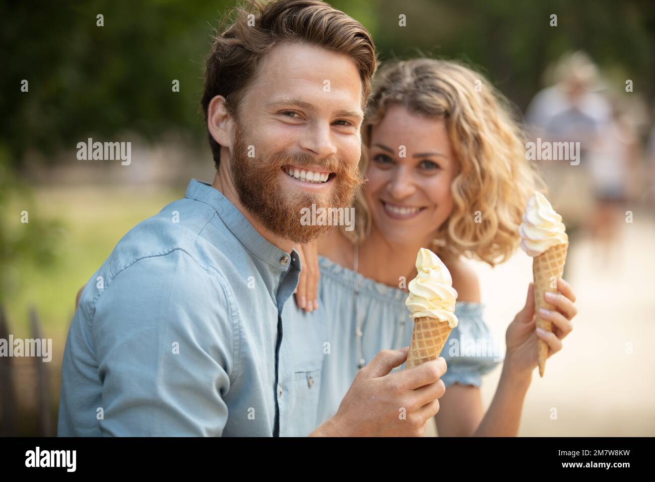 couple in park eating ice cream cones Stock Photo - Alamy