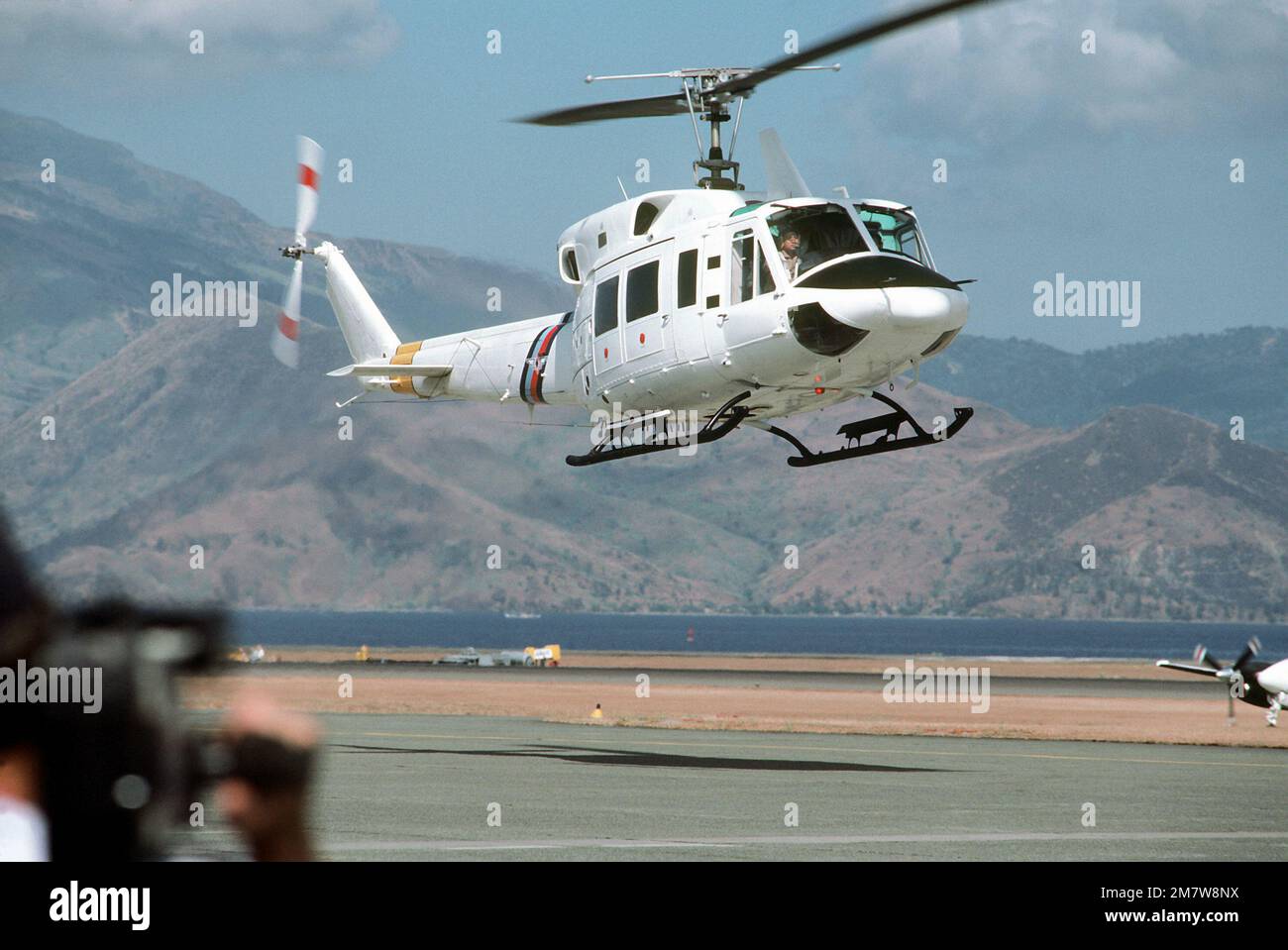 A UH-1N helicopter, with Philippine Army officers aboard, prepares to ...