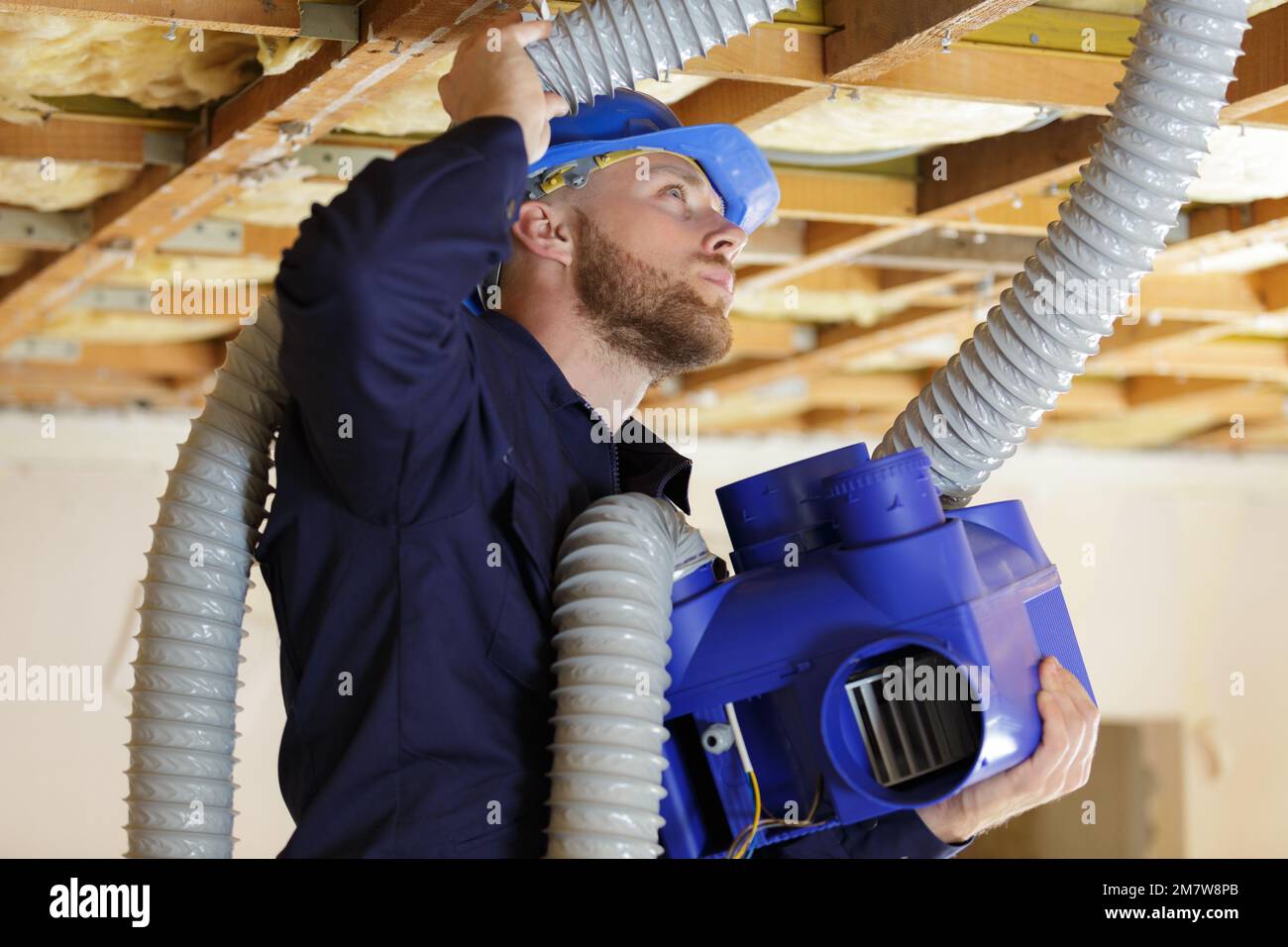 Professional plumber fixing piping hi-res stock photography and images ...