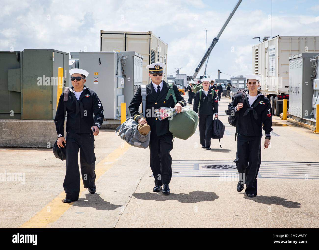 Sailors assigned to the Los Angeles-class fast-attack submarine USS ...