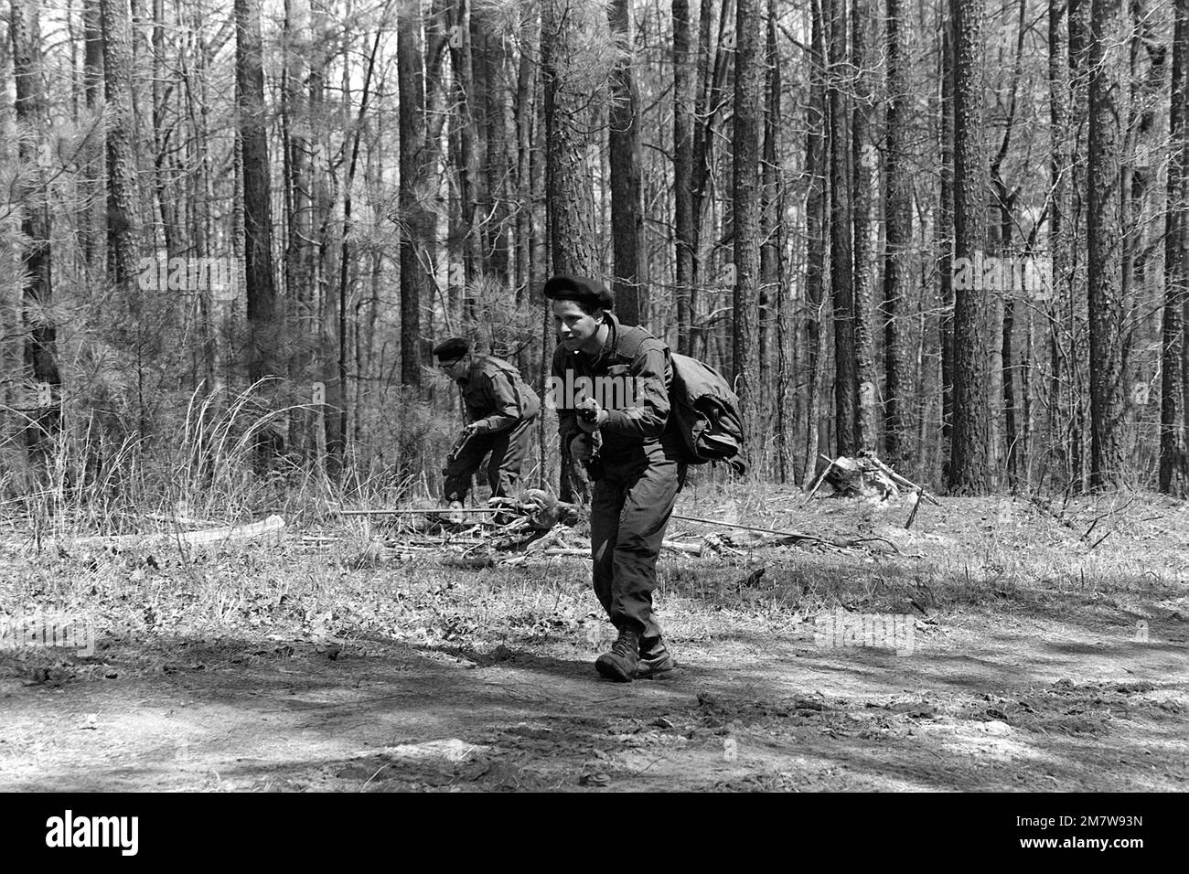 Two U.S. Marines from the 6th Marine Amphibious Brigade play the role ...