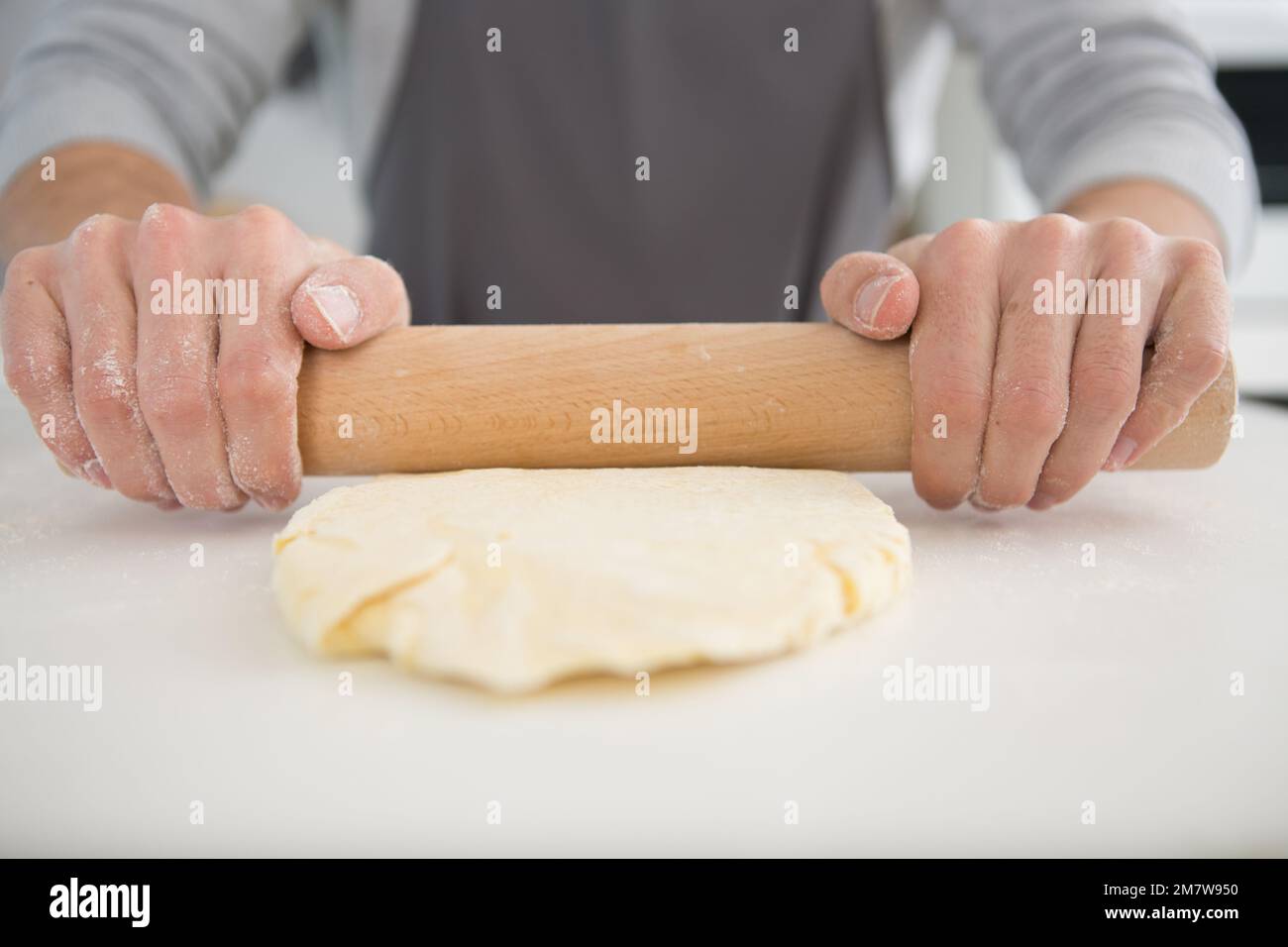 Old woman making pies dough hi-res stock photography and images - Alamy