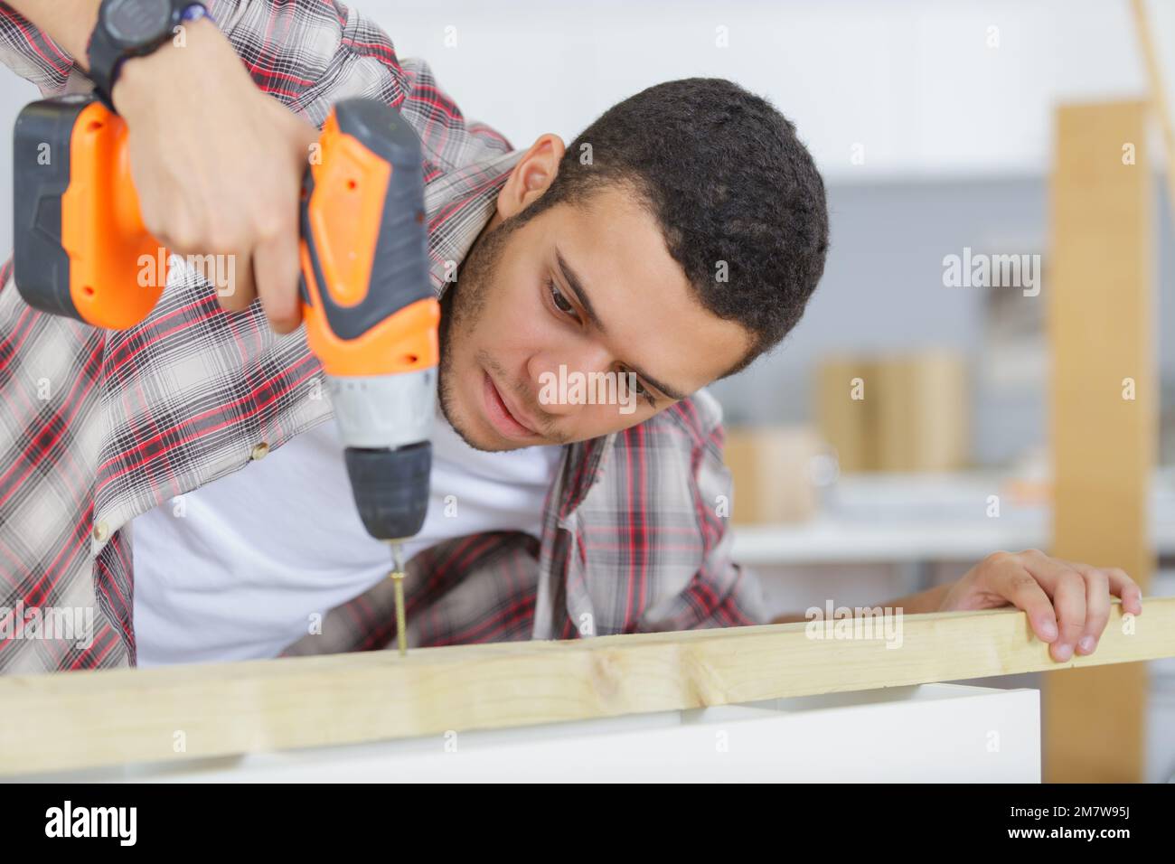 a young man at work Stock Photo - Alamy