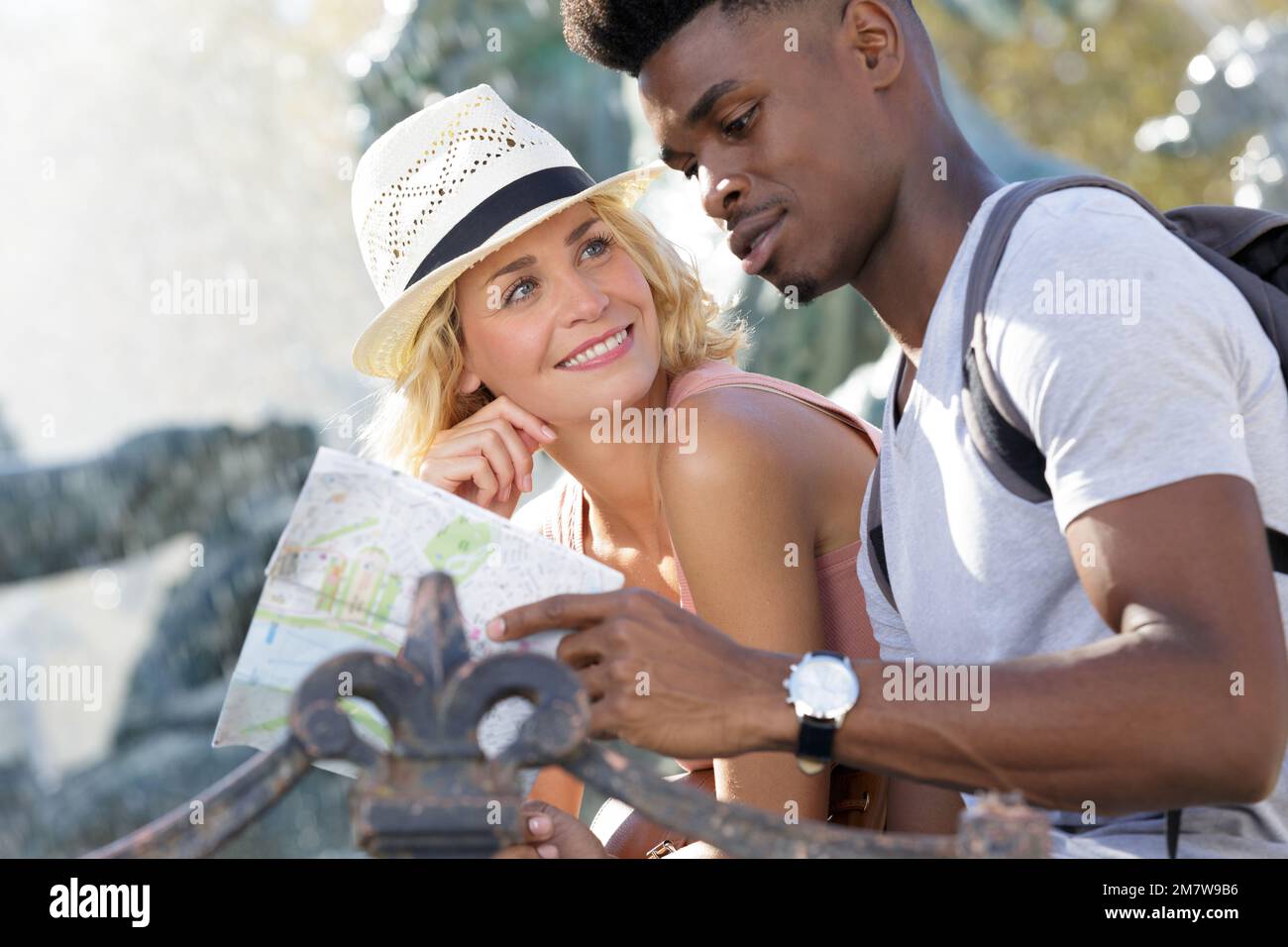 traveling couple with map outdoors Stock Photo - Alamy