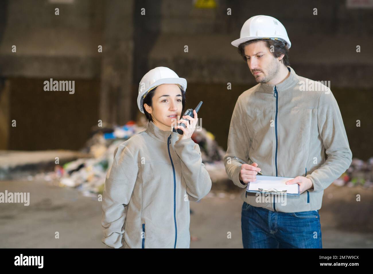 portrait of warehouse employees talking Stock Photo - Alamy