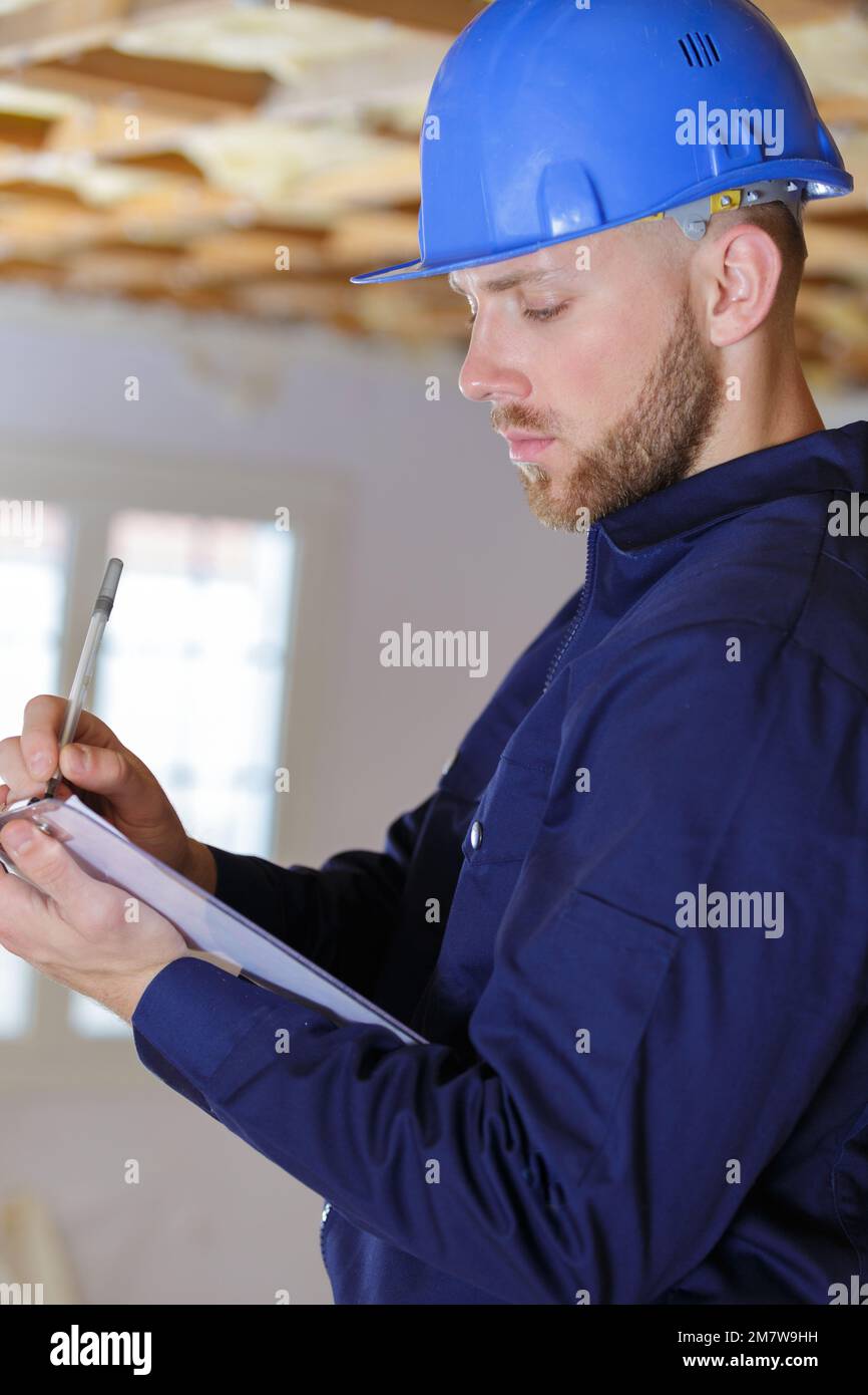 car mechanic checking a car engine Stock Photo - Alamy