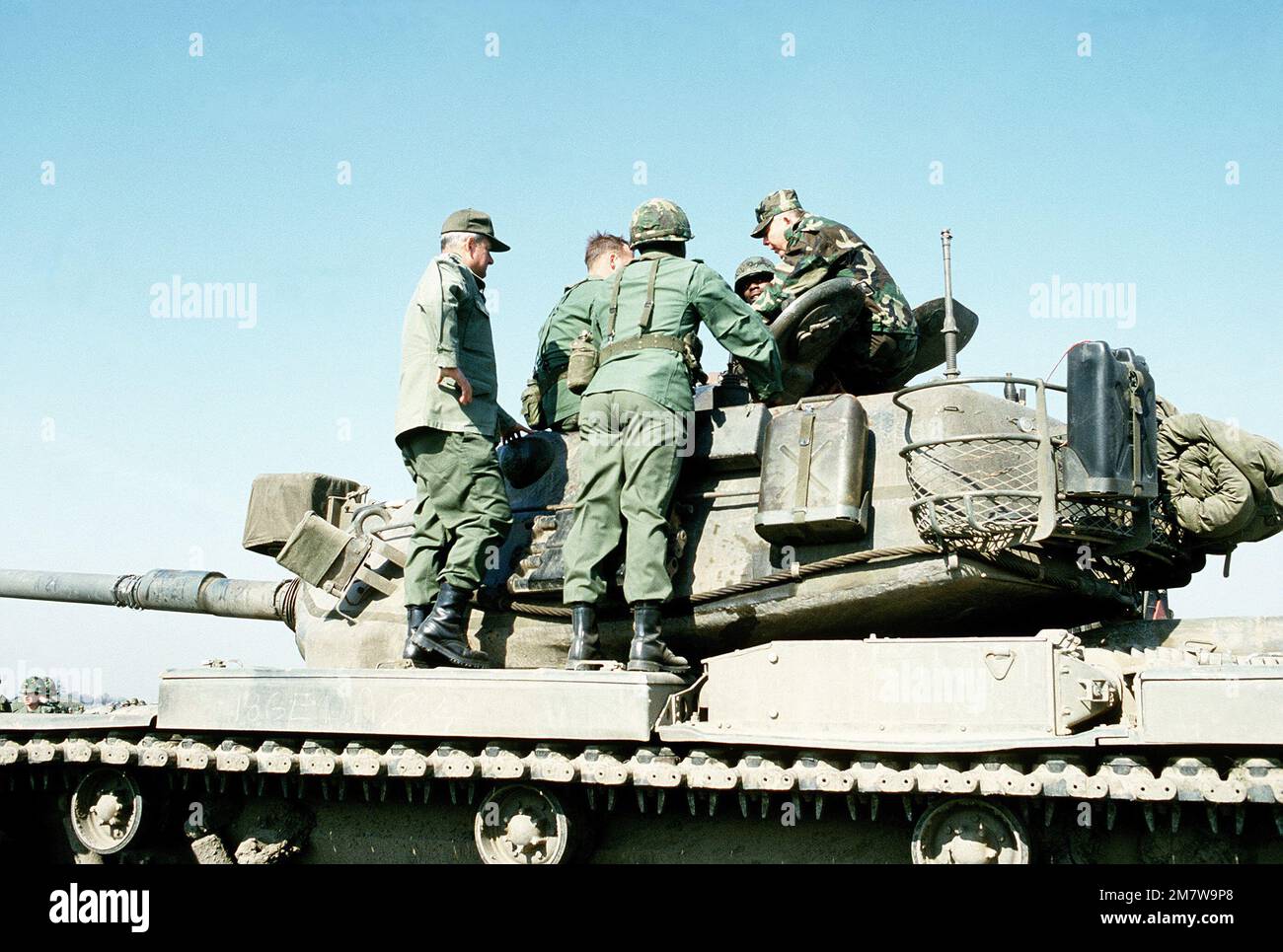 SGM of the Army William A. Connelly quizzes tank operators from the ...