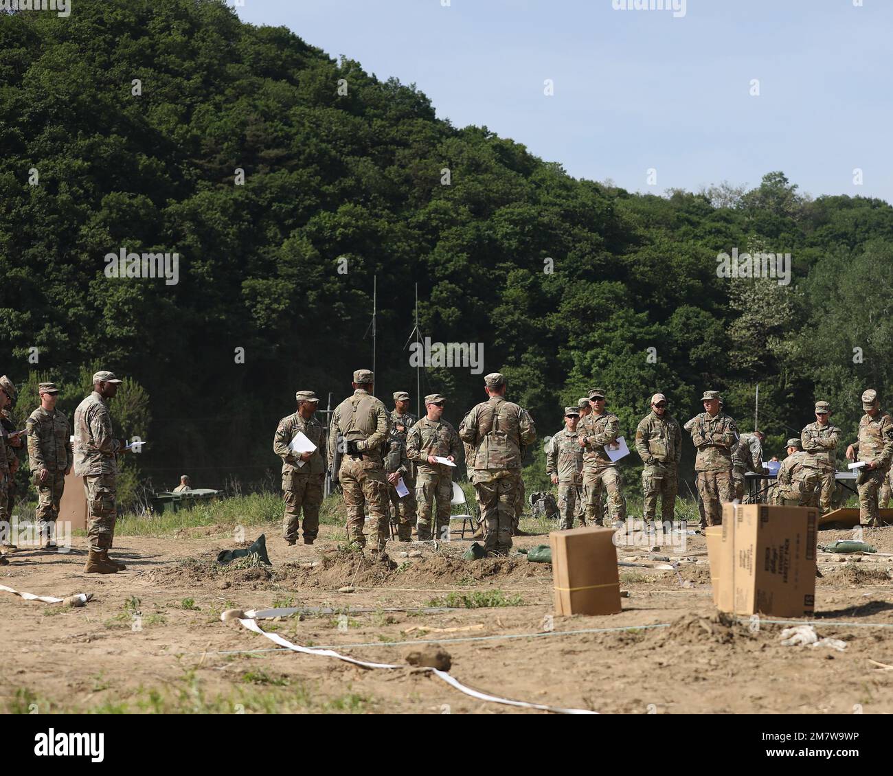 The brigade's S3 current operations team briefs leaders using a ...
