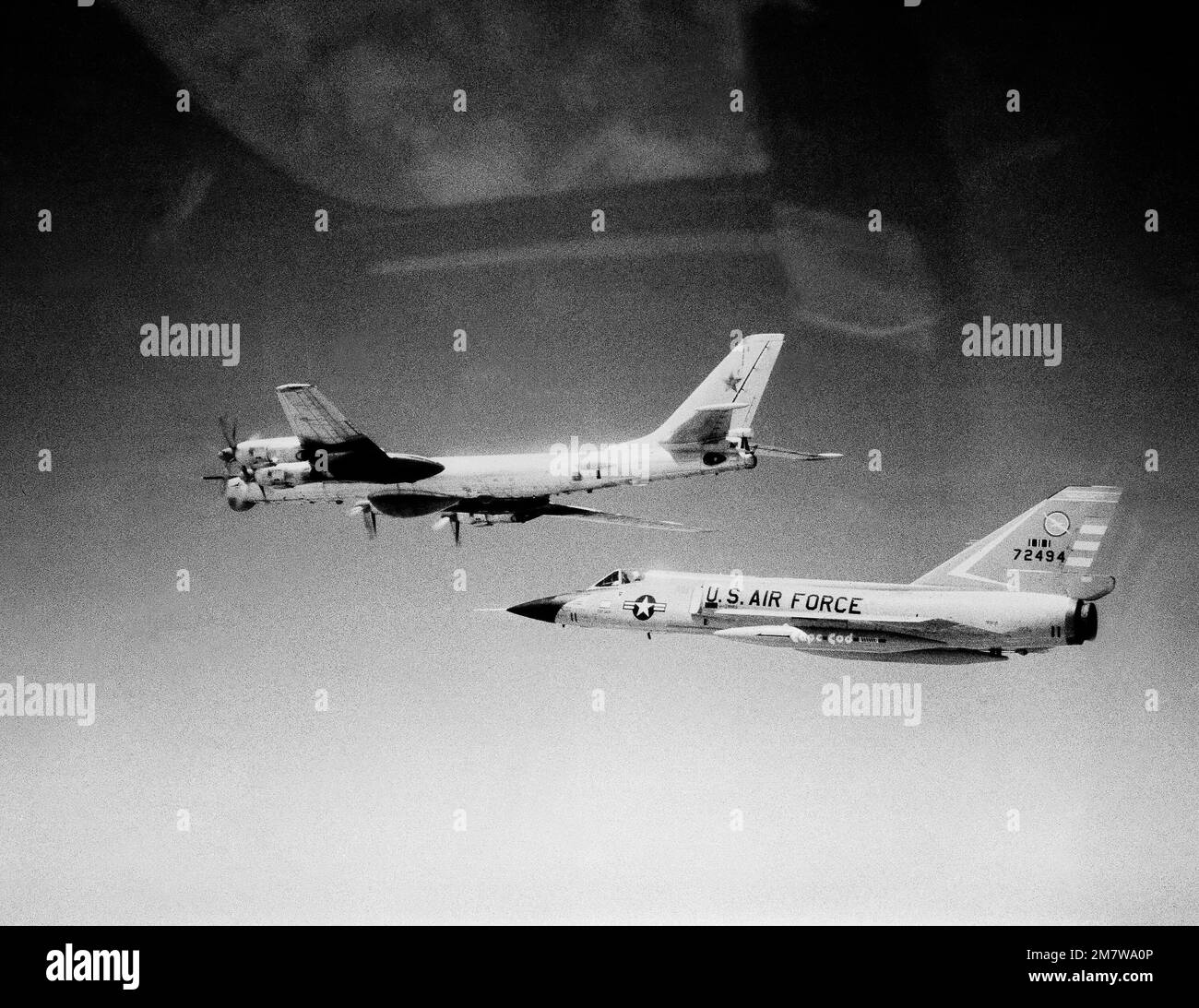 A left side view of an F-106A Delta Dart aircraft intercepting a Soviet ...
