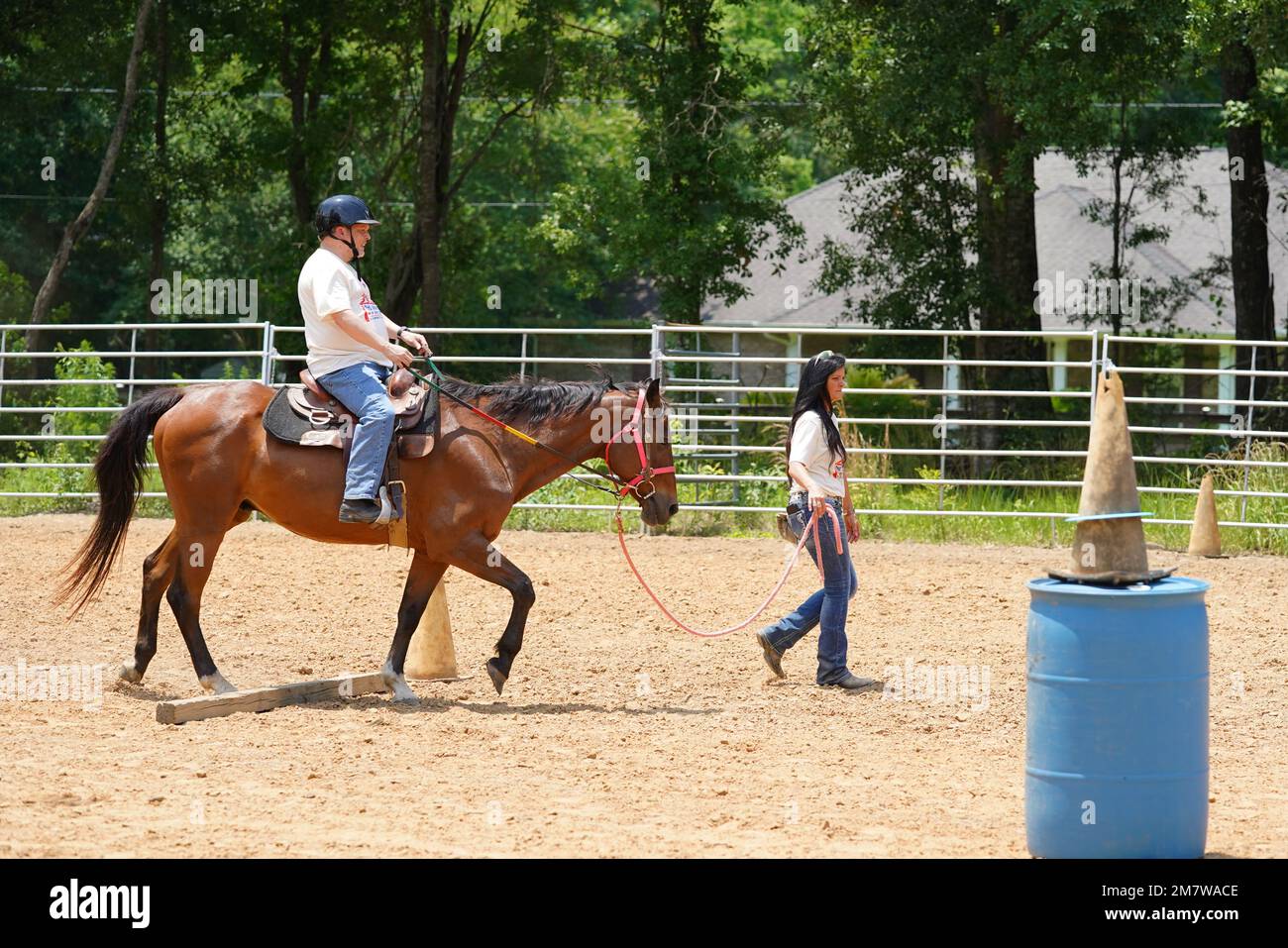 Special Olympics Mississippi athlete Kyle Dutiel rides a horse as ...