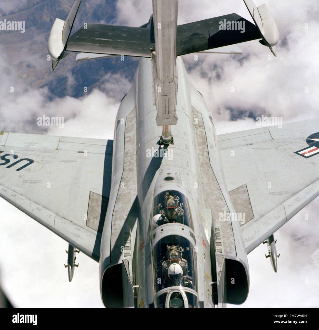 Top view of an F-4 Phantom II aircraft as it is refueled by a KC-10A ...