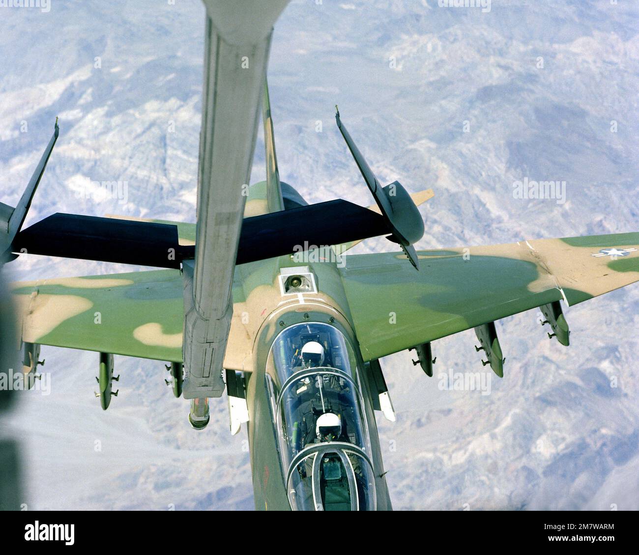 A view of an A-7K Corsair II aircraft as it maneuvers into position to ...