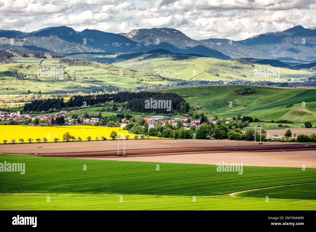 Agricultural fields in the countryside. Mountains at background Stock ...