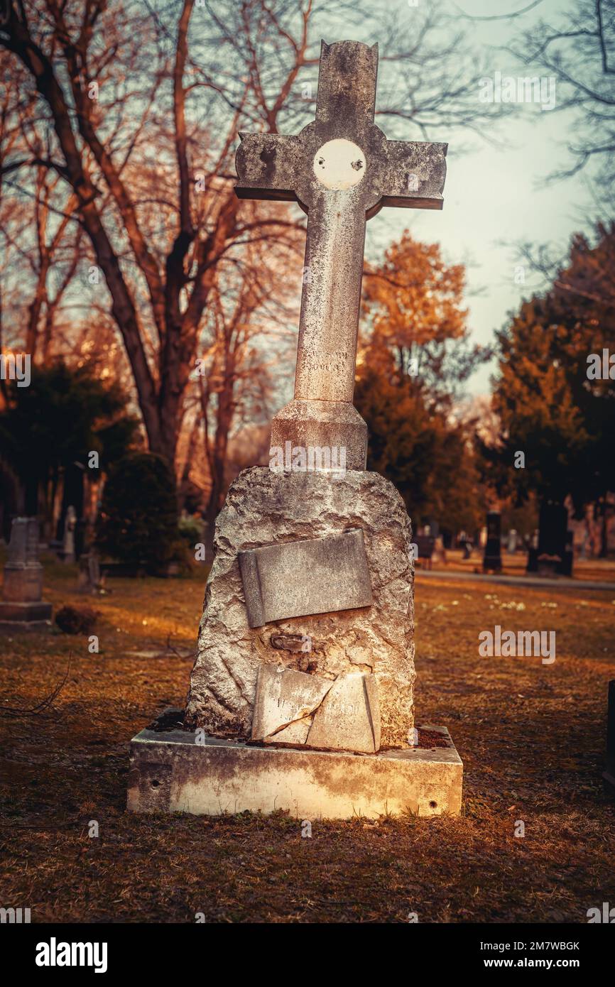 old grave in the cemetery. Cemetery with places for names on the ...